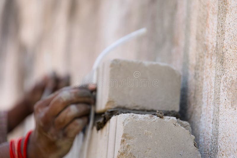 Closeup of a Construction Worker Installing and Measuring a Concrete ...