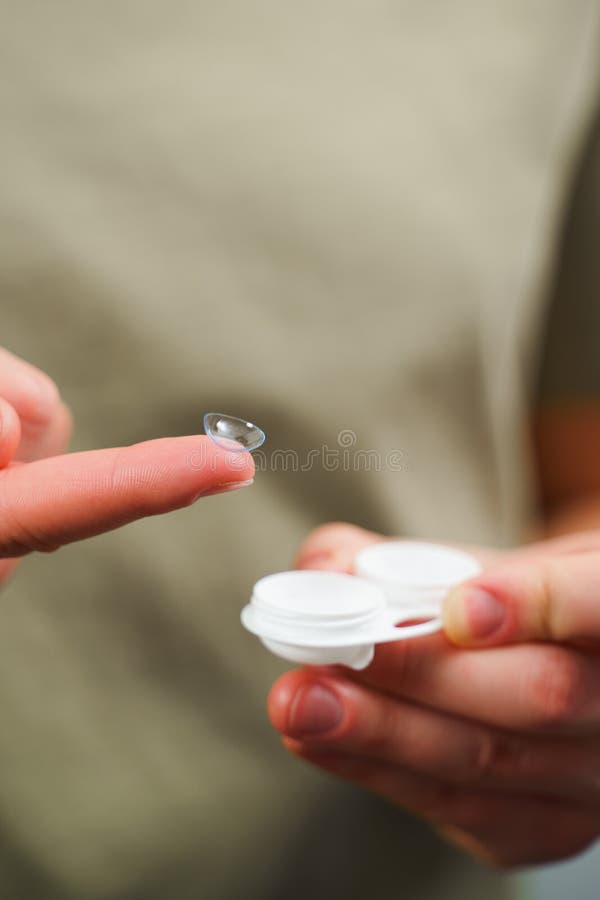 Closeup Contact Lens for Vision Correction in Hands. Eyesight ...