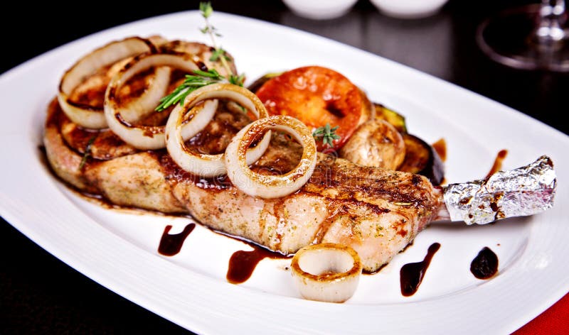 Closeup of Cooked Pork with Vegetables Served on White Plate Stock ...