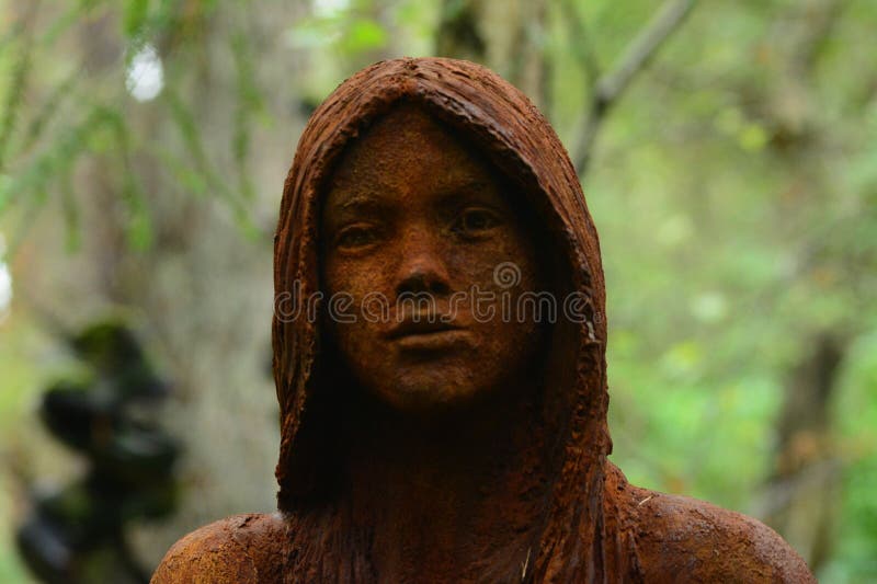 Closeup of Creative Human Sculptures in a Green Forest Editorial Photo ...