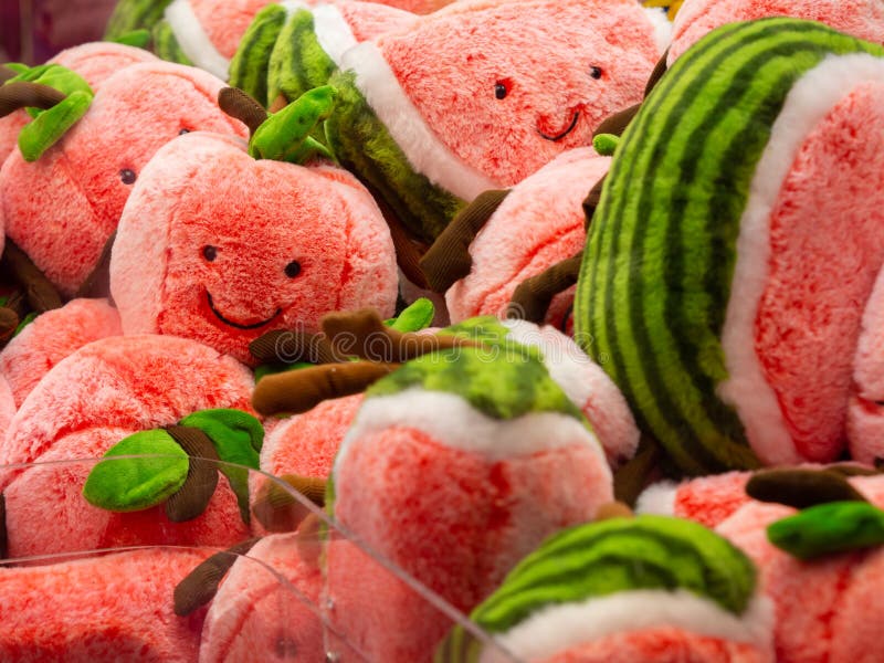 Cute Smiley Face of Watermelon Dolls in an Arcade Claw Crane Game ...