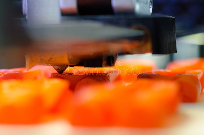 3d Printer Printing Orange Plastic Pieces Stock Photo - Image of ...