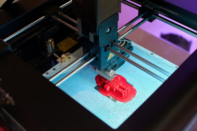 Closeup 3D Printer Prints Model of a Red Robot Stock Photo - Image of ...