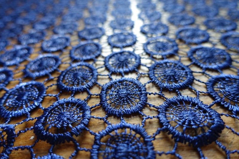 Closeup of Dark Blue Crochet Lacy Fabric on Wood Stock Image - Image of ...