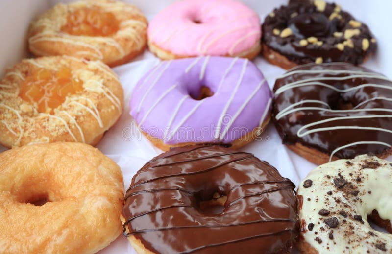Closeup of Assorted Doughnuts in a Box Stock Photo - Image of copy ...