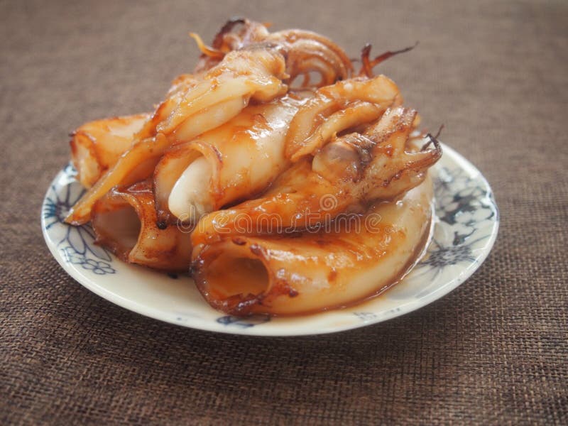 Closeup of Delicious Cooked Squid in a Plate on a Table Stock Image ...