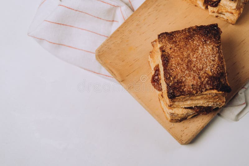 Closeup of Delicious Puff Pastry with Jam Inside on the Table Stock ...