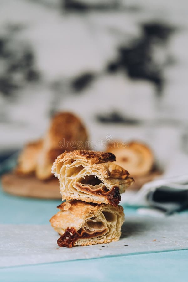 Closeup of Delicious Sliced Puff Pastry with Jam Inside on the Table ...