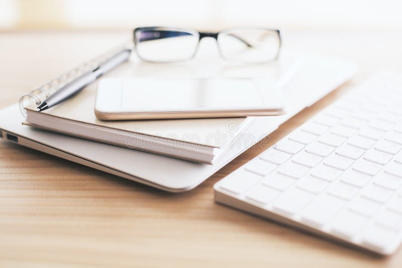 Closeup of Desktop with Items Stock Photo - Image of notebook, blurry ...