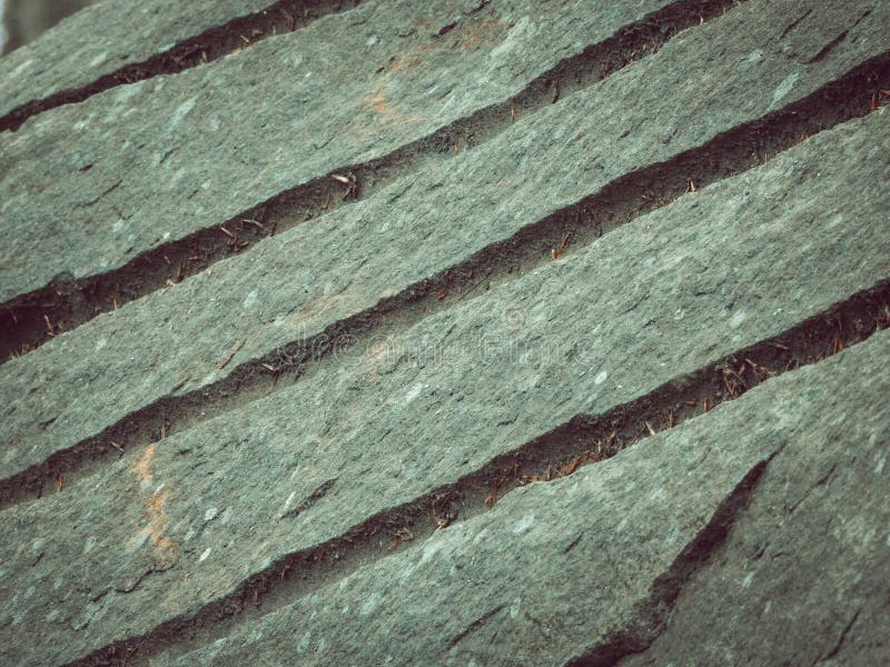 Closeup of Diagonal Carved Lines on a Rock Surface Stock Image - Image ...