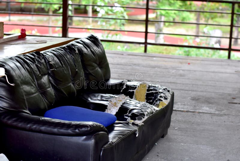 Dirty Old Colorful Sofa is Left with Garbage on the Side of the Road ...