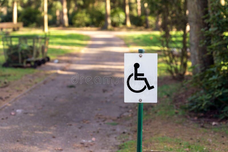 Closeup of a Disabled Parking Sign in a Park Stock Photo - Image of ...