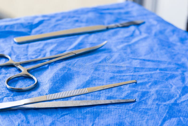 Closeup of Dissection Kit Tools on Blue Surgical Cloth Stock Photo ...