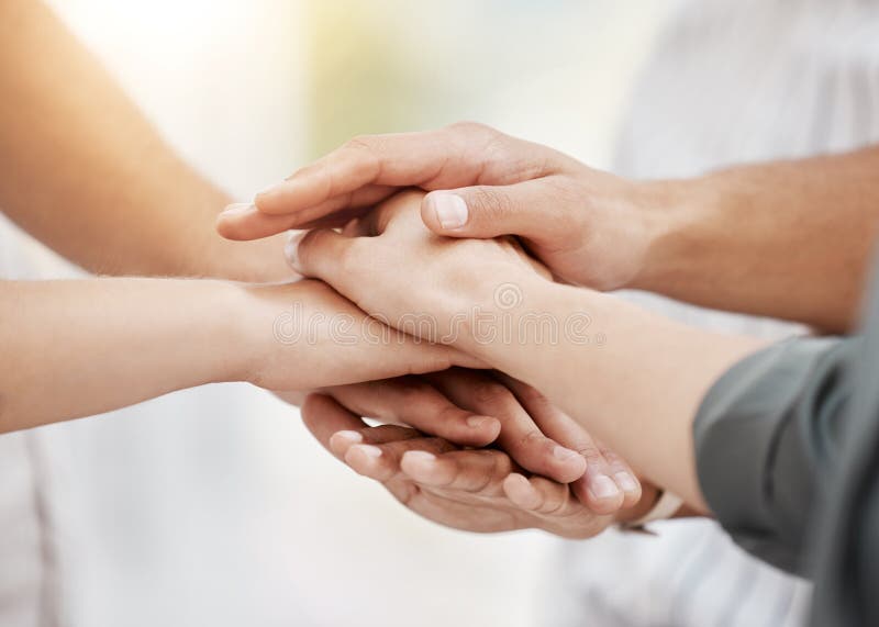 Closeup of Diverse Group of People Stacking Hands Together in a Pile To ...