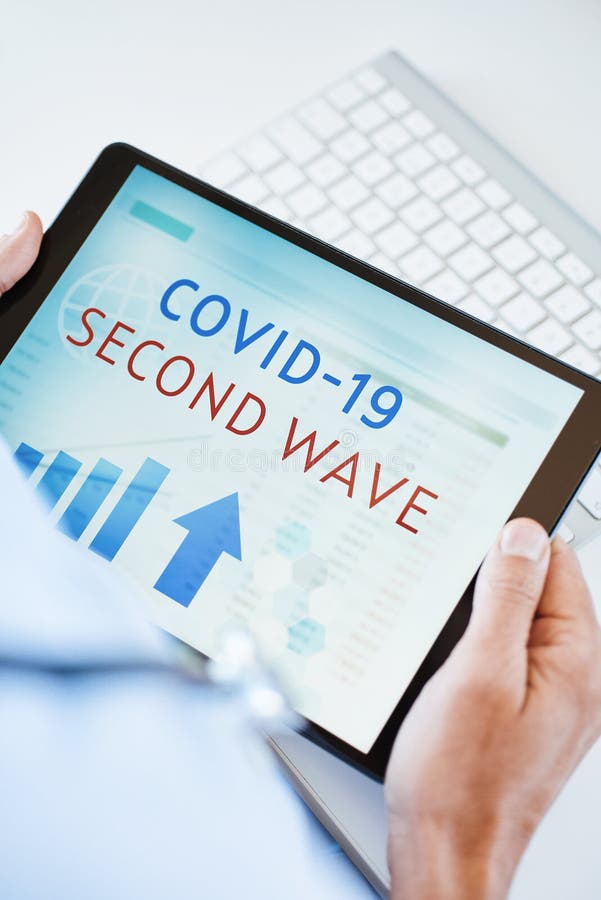 Doctor and Text Covid-19 Second Wave in a Tablet Stock Image - Image of ...