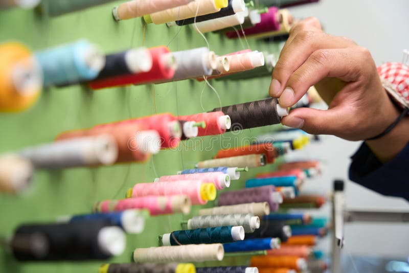 Sewer Selecting Sewing Threads in His Workshop Stock Photo - Image of ...