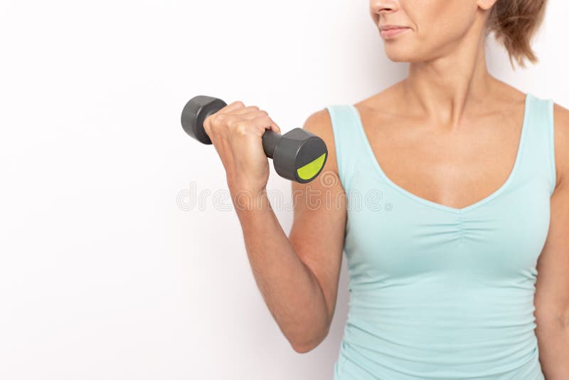 Lean Woman Poses for Photo with One Hand on Head and Other Hand Stock ...