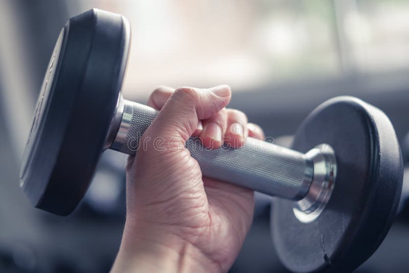 Closeup Dumbbell Holding in Left Hand for Men Stock Photo - Image of ...