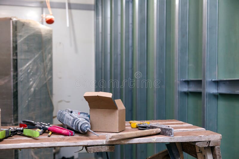 Closeup Dusty Construction Building Tools on the Scaffolding, Puncher ...