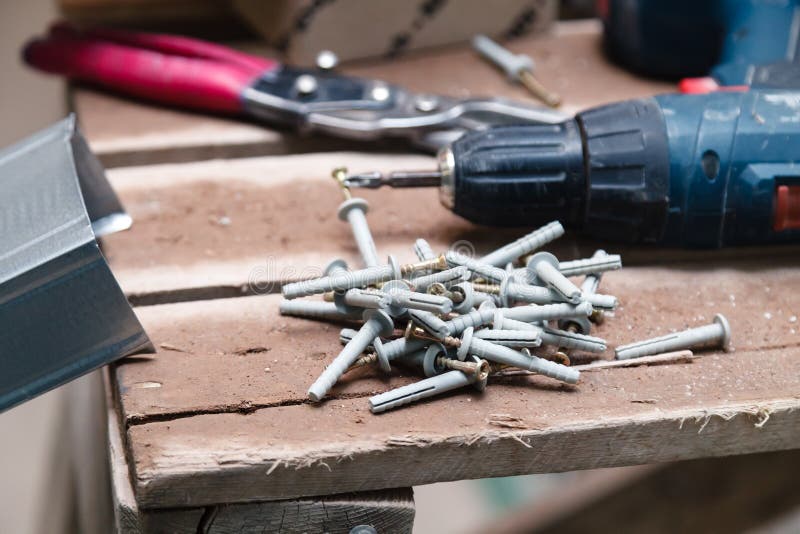 Closeup Dusty Construction Building Tools on the Scaffolding, Puncher ...