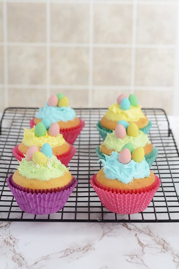 Easter Cupcakes Cooling on Wire Rack Stock Photo - Image of marble ...