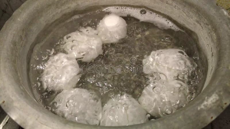 Closeup of Eggs Being Boiled in an Old Silver Vessel Stock Video ...