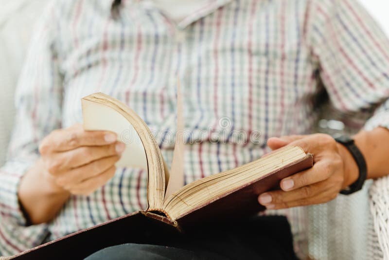Closeup Elder Hand Opening Reading a Book Stock Photo - Image of ...