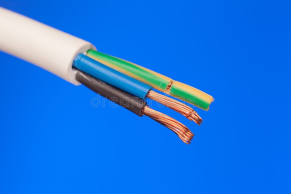Closeup of a Electric Cable on a Blue Background. Stock Photo - Image ...