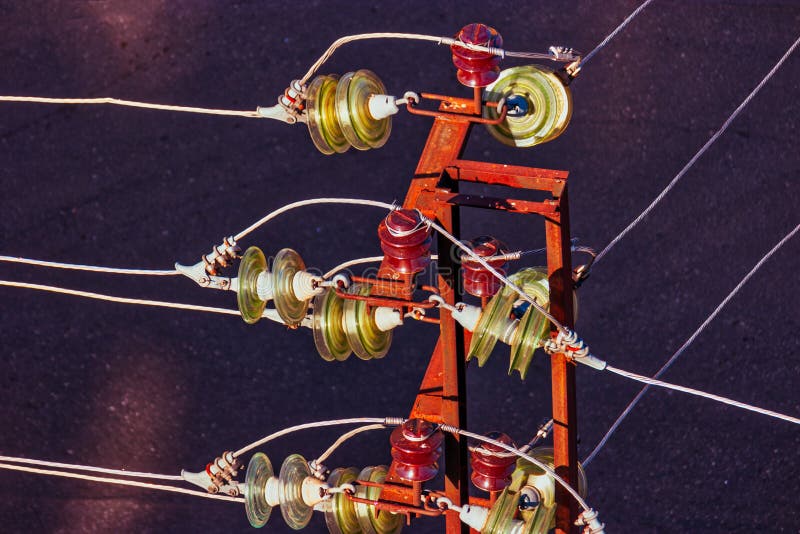 Closeup of Electric Insulators Made of Glass Mounted on Rusty Power ...