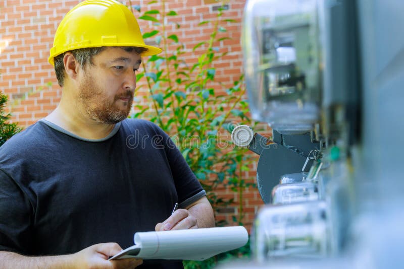 Electrical Engineer on during Checking in Yellow Helmet Technician ...