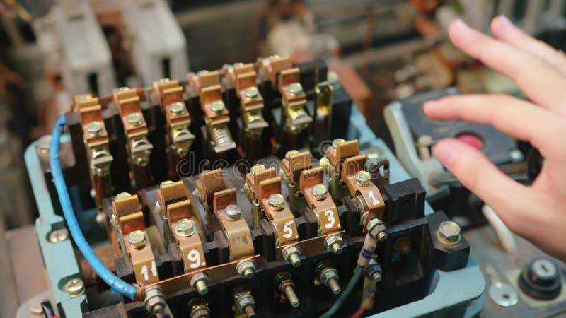 Electricians Hands Testing Current Electric in Control Panel ...