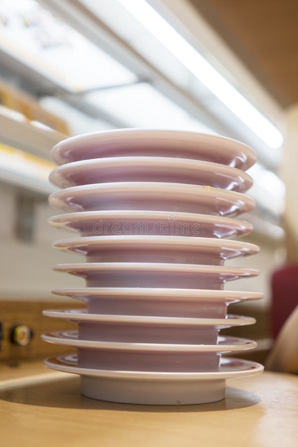 Empty Dishes Piling on the Wooden Table Stock Photo - Image of ...