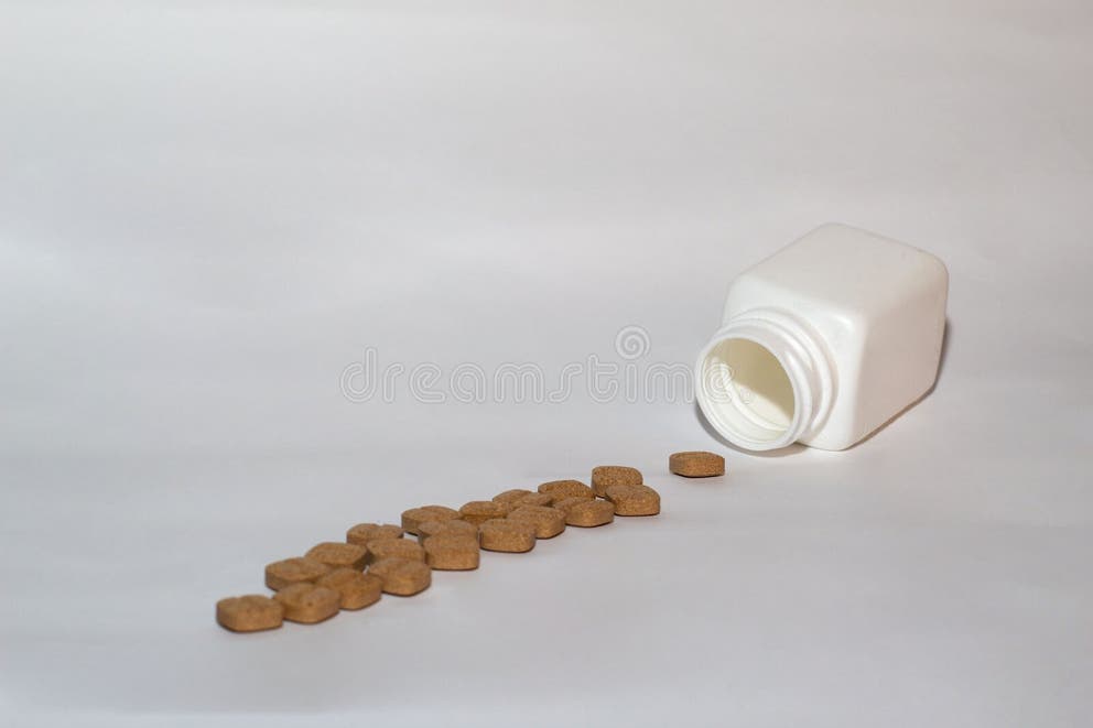 Closeup of an Empty Plastic Bottle with Kibble Spilled Out and ...