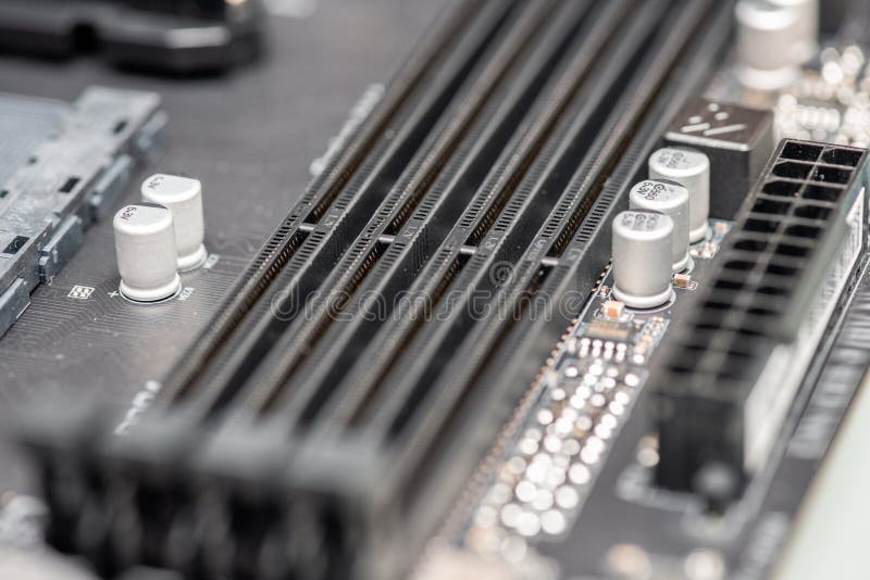 Closeup on Empty RAM Slots on a Modern Black Silver Motherboard. Random ...