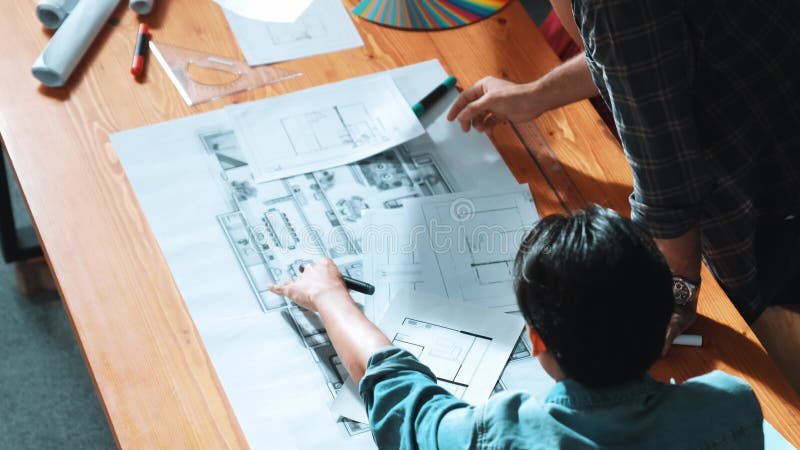 Close Up of Civil Engineer Hand Hold Blueprint and Shaking Hand ...