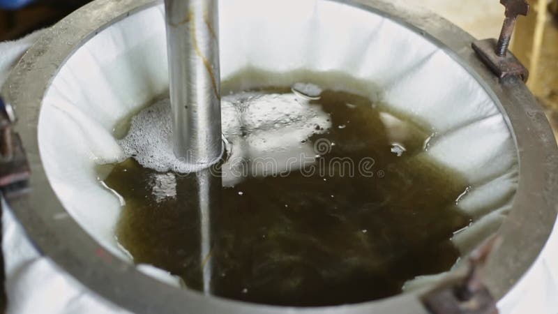 Closeup of the Extraction or Purification of the Liquid Soap Solution ...