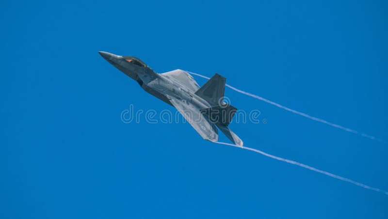 Closeup of F-22 Raptor Airplane Flying in the Blue Sky Editorial Image ...