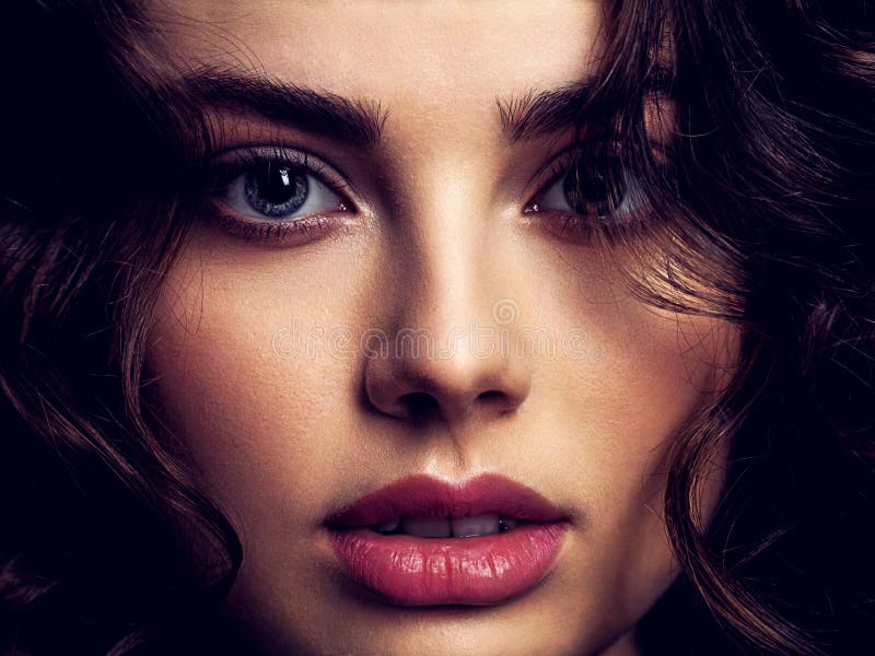 Closeup Face Of A Beautiful Woman With A Smoky Eye Makeup Stock Image