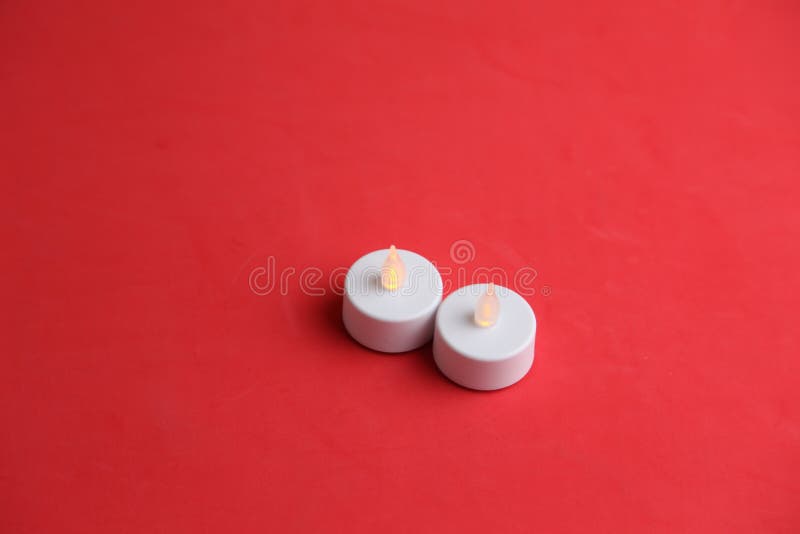 Closeup of Fake Romantic Candles on a Red Surface Stock Photo - Image ...