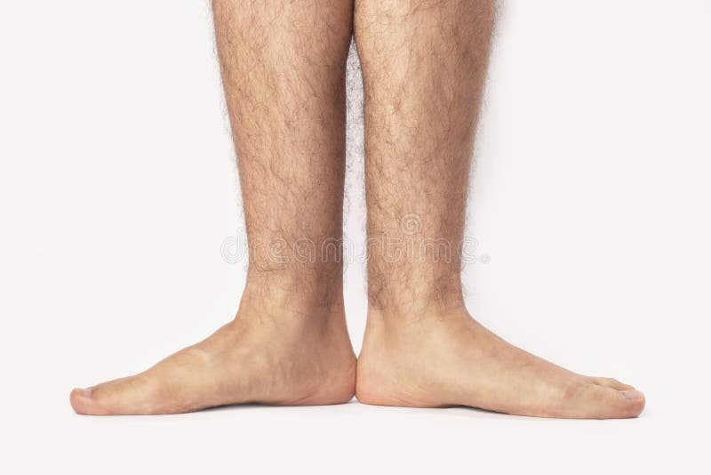 Closeup of the Feet of a Male Standing in the First Position Against a ...