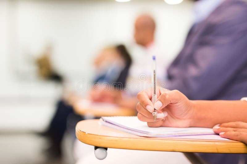 Closeup of Female Hand Taking Notes during Lecture Stock Image - Image ...