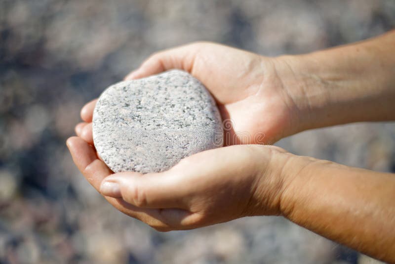 Closeup of Female Hands Holding a Stone in Warm Evening Light Stock ...