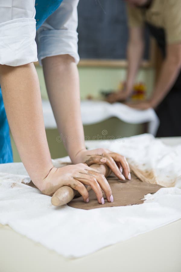Closeup of Female Hands while Preparing a Clay Pieces on Table in ...