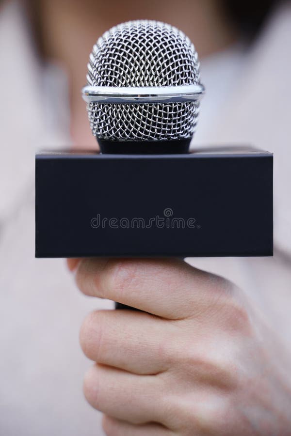 Closeup Female Hands with a Reporter Microphone Stock Image - Image of ...