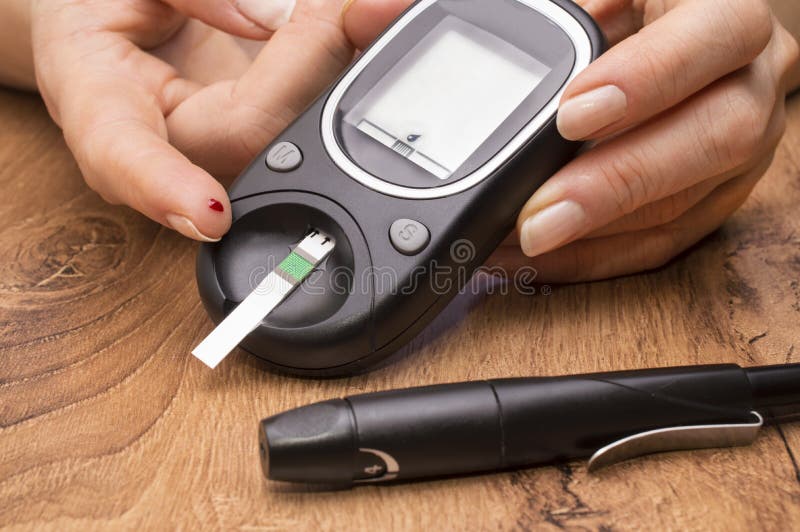 Closeup Female Hands Using Glucometer Scanner Stock Image - Image of ...