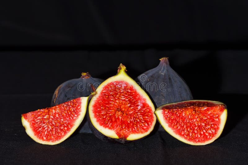 Closeup of Fig Fruit Wedges on a Dark Background Stock Image - Image of ...