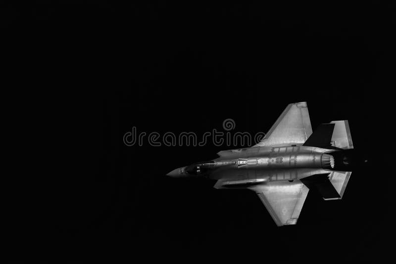 Closeup of a Fighter Jet Pirouetting in the Night Sky Stock Photo ...