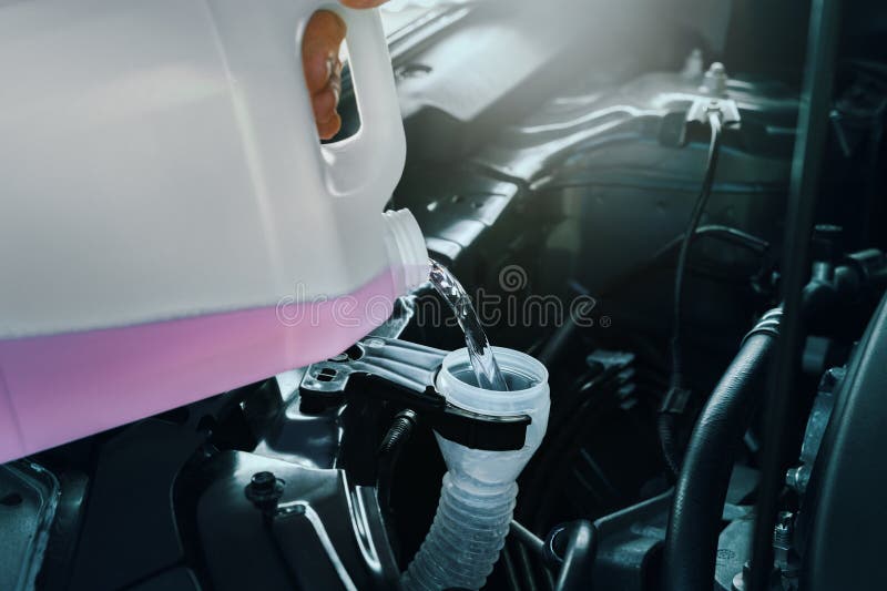 Filling the Tank of Car Windshield Washer Fluid Stock Photo - Image of ...
