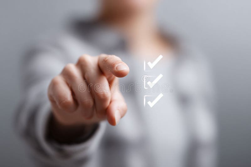 Closeup of a Finger Pressing a Digital Checklist. Symbolizes ...