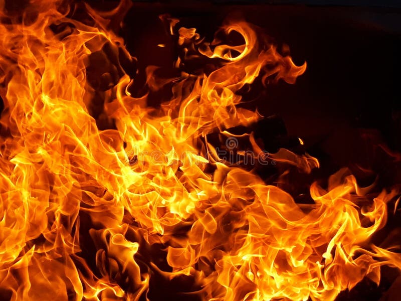Closeup of Fire Flames at Night with a Blurry Background - Great for ...